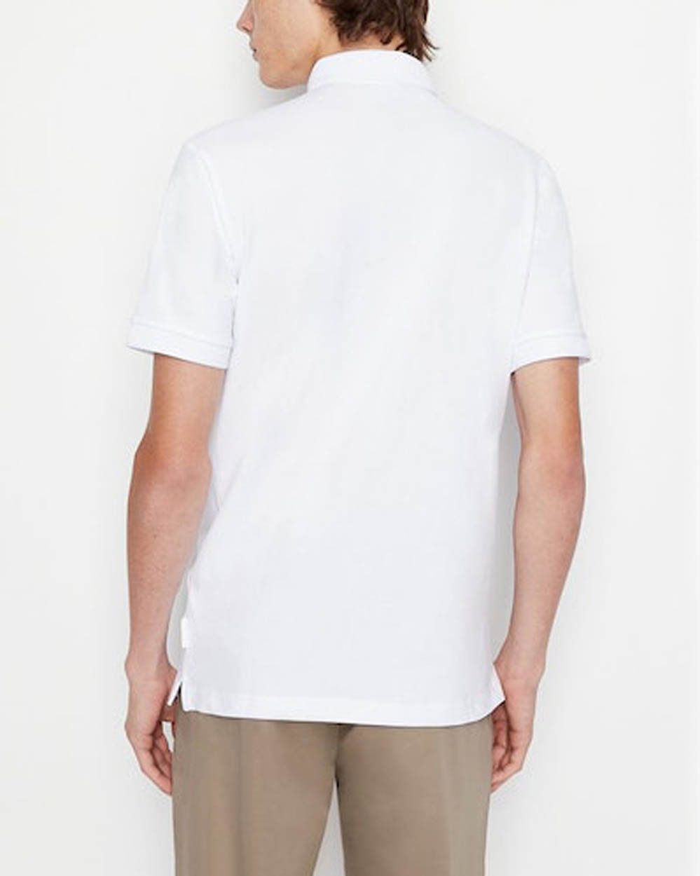 Polo bianca mezza manica in cotone stretch con abbottonatura coperta ...