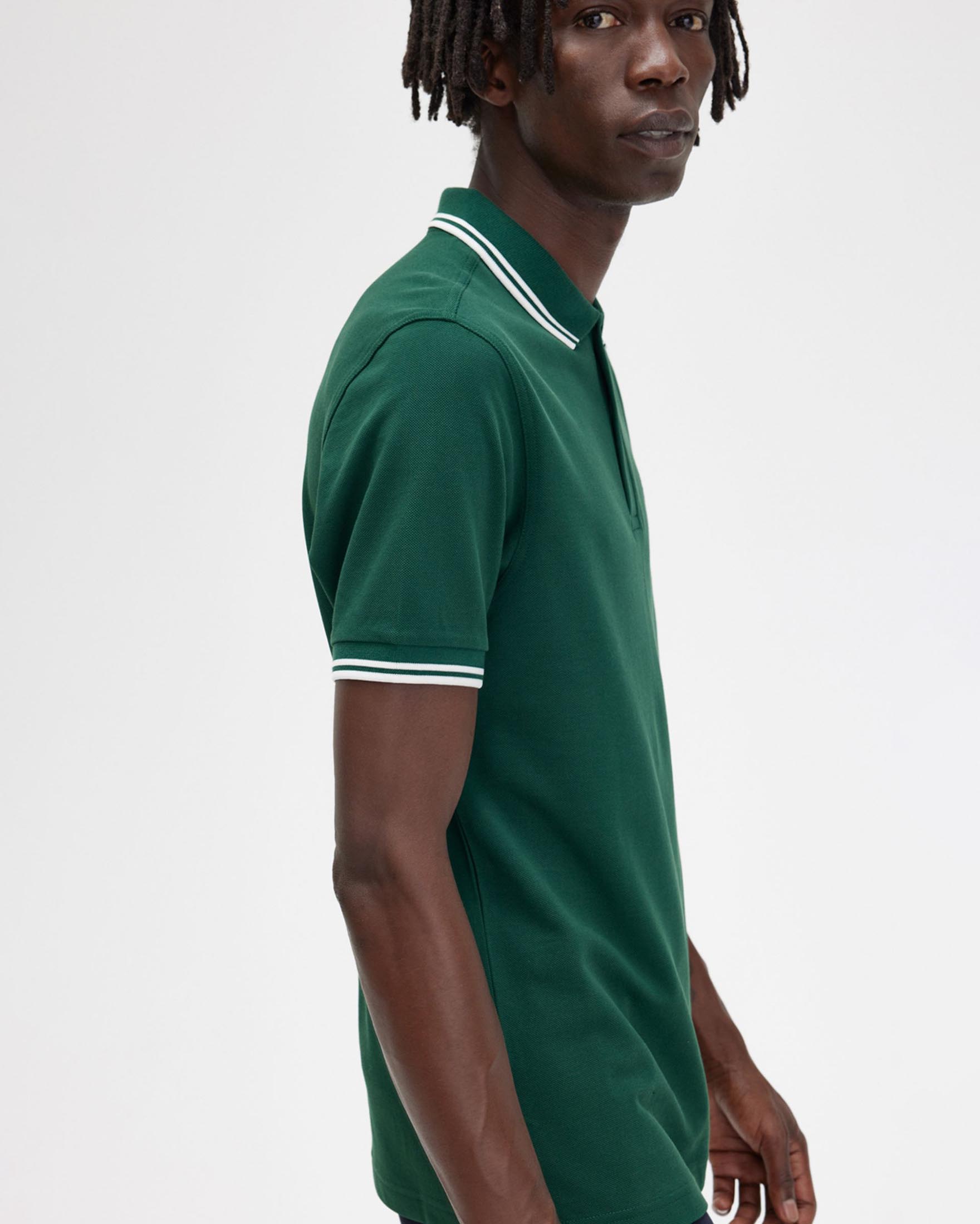 Polo mezza manica verde con bordino bianco