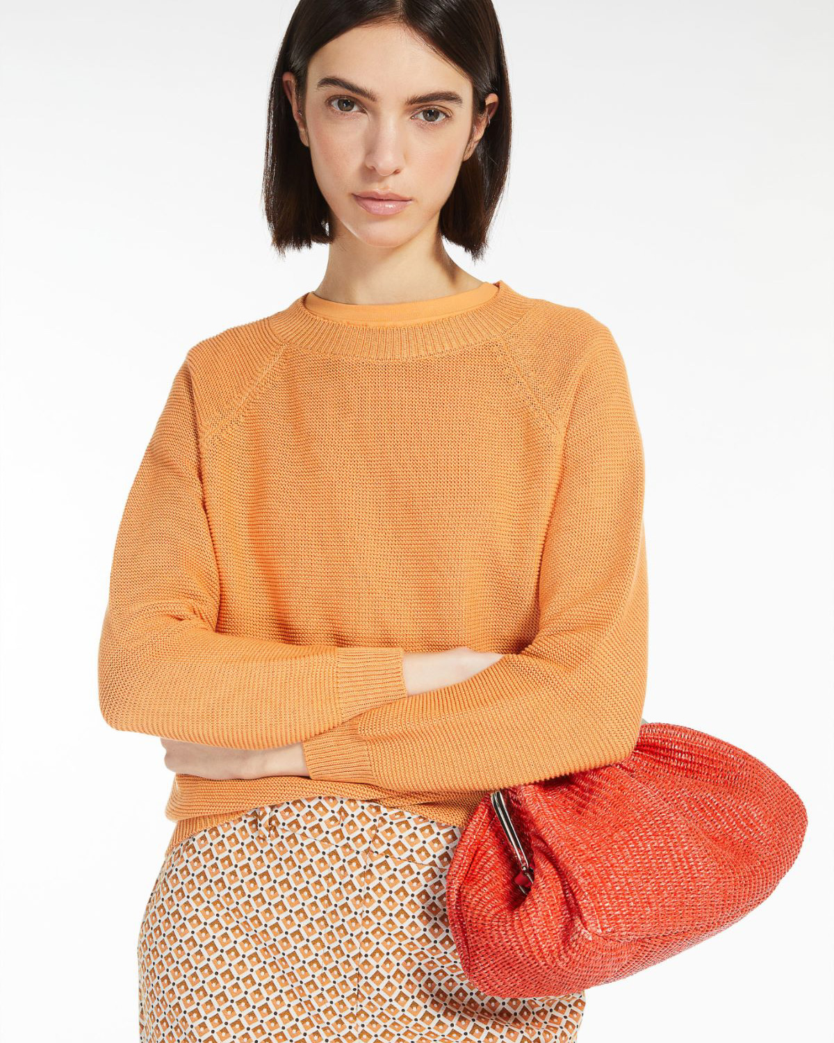 Maglia color mango in puro cotone punto riso con maniche raglan