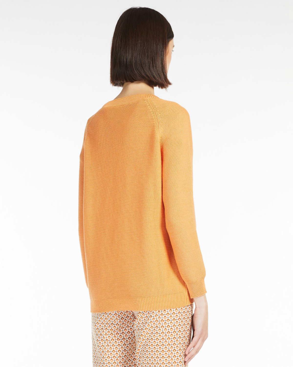 Maglia color mango in puro cotone punto riso con maniche raglan