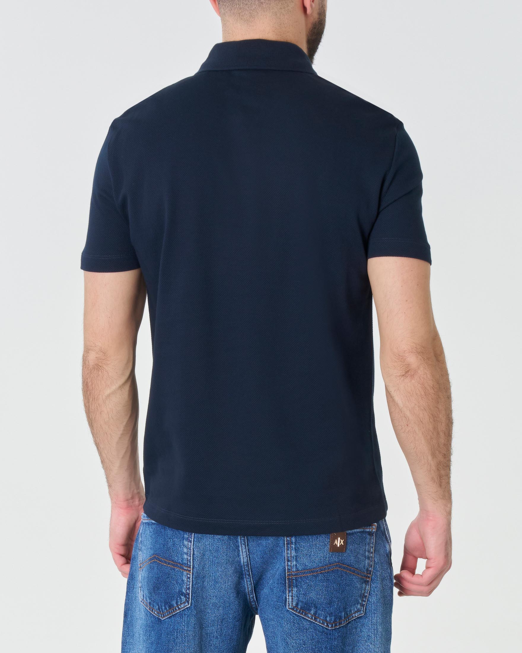 Polo blu in piqué di puro cotone con colletto classico e chiusura a ...