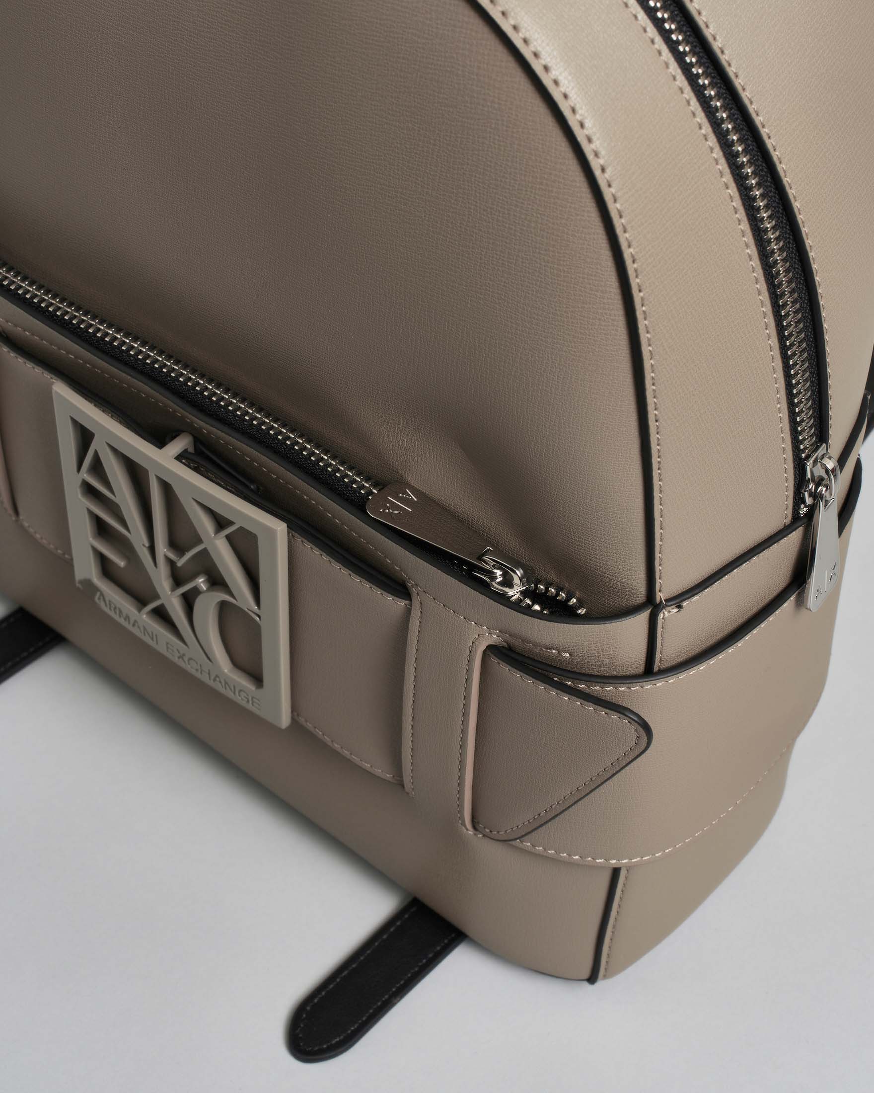 Zaino color taupe Armani Exchange in similplle liscia con maxi fibbia logo in metallo in tono ...
